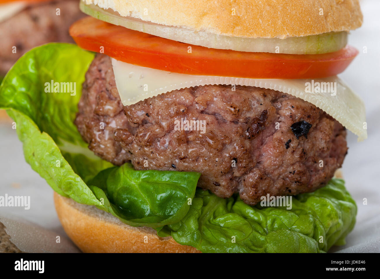 Giant homemade burger classic american cheeseburger on brown sack Stock ...