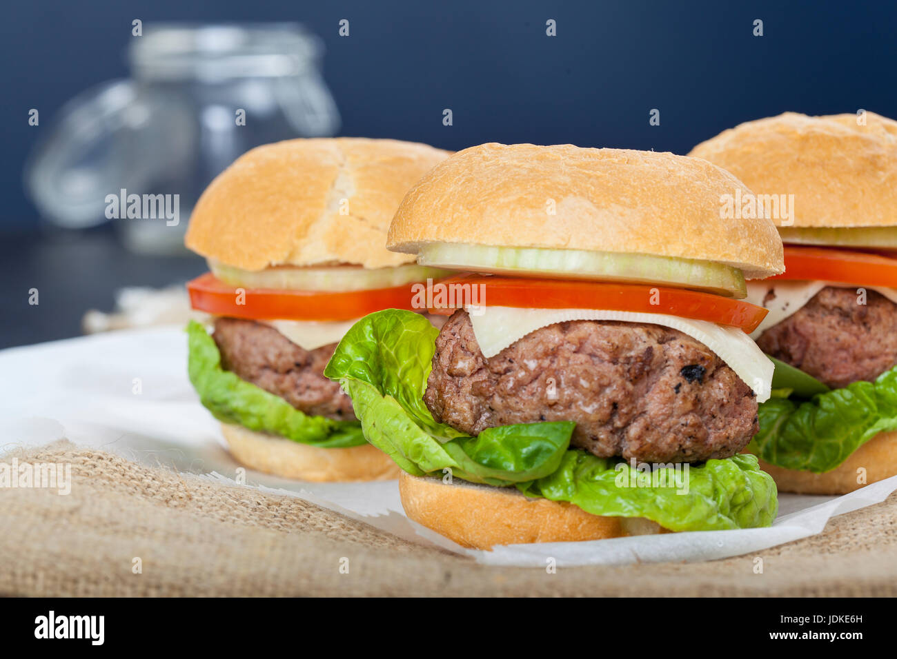 Giant homemade burger classic american cheeseburger on brown sack Stock ...