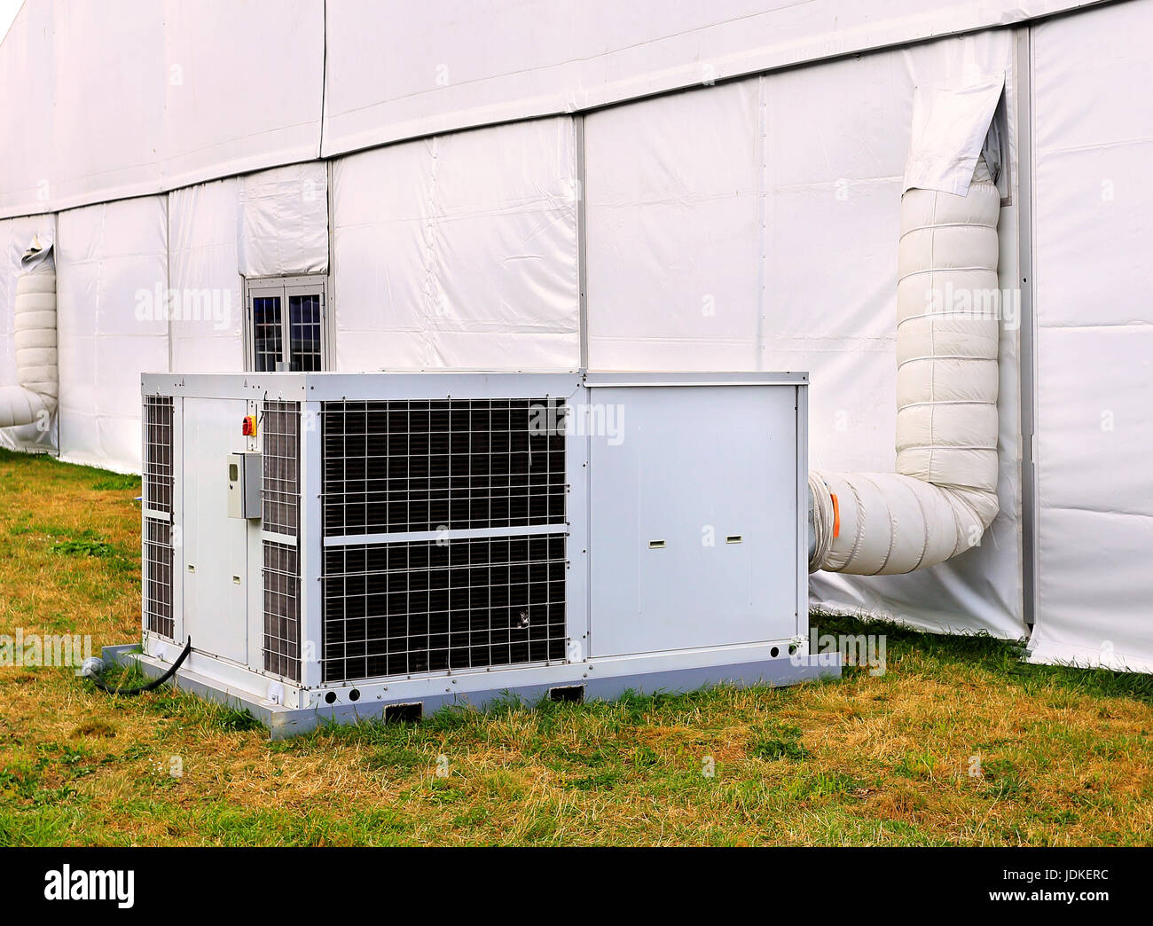 White tent and technical support unit at the exhibition camp Stock ...