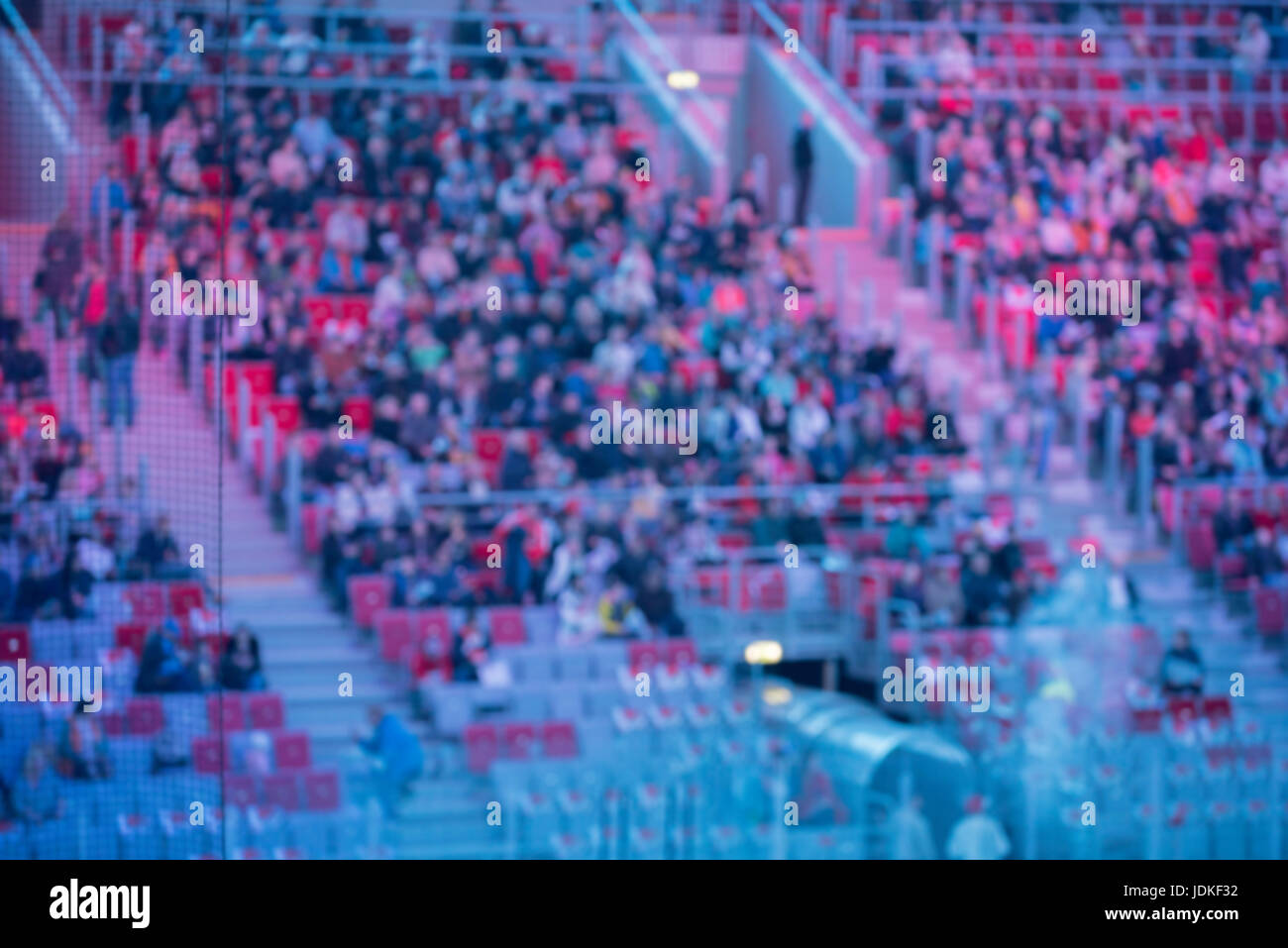 Blurred crowd of spectators on a stadium bleachers at a sporting event ...