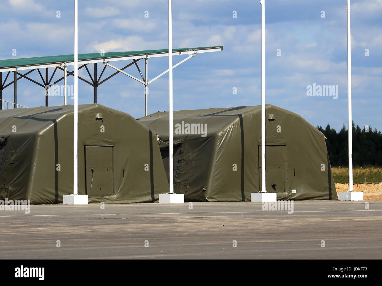 Tents for placement of personnel on military range Stock Photo - Alamy