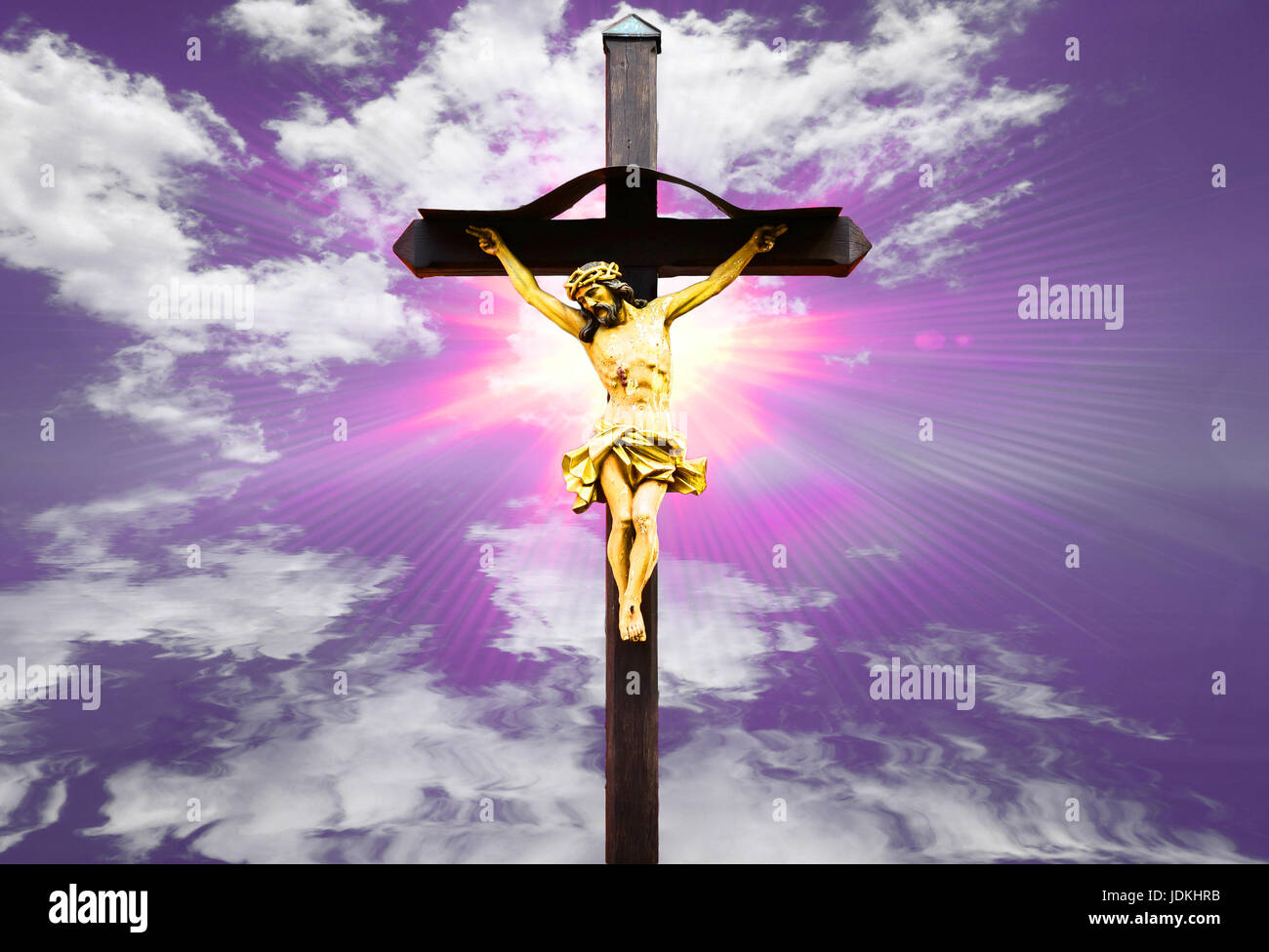 Jesus Christ statue against color backgrounds Stock Photo - Alamy