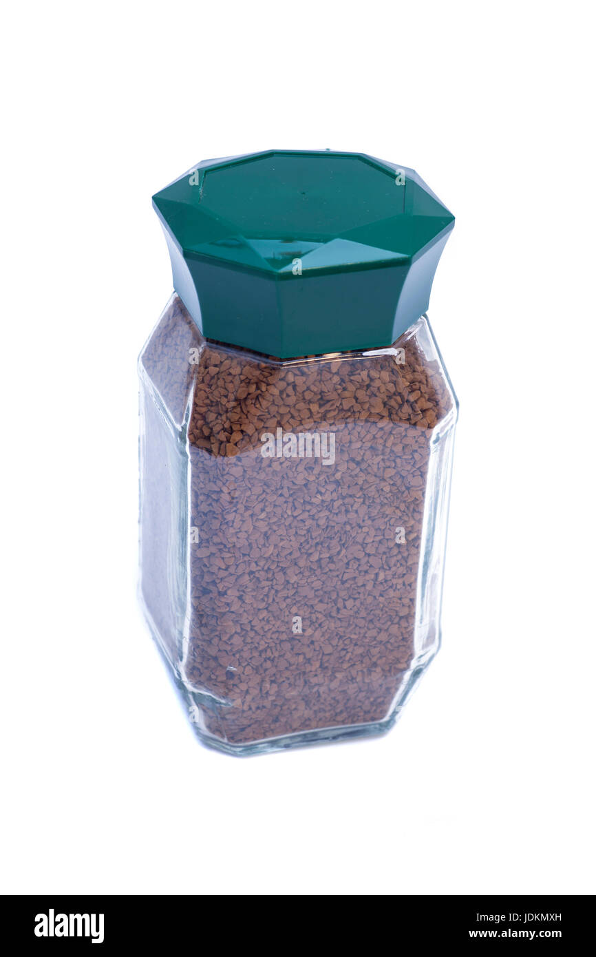 Instant coffee in glass pot isolated on white Stock Photo - Alamy