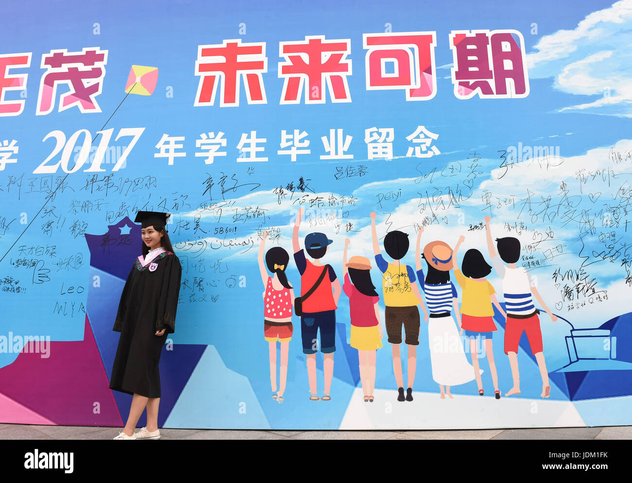 Nanjing, China's Jiangsu Province. 20th June, 2017. A graduate poses ...