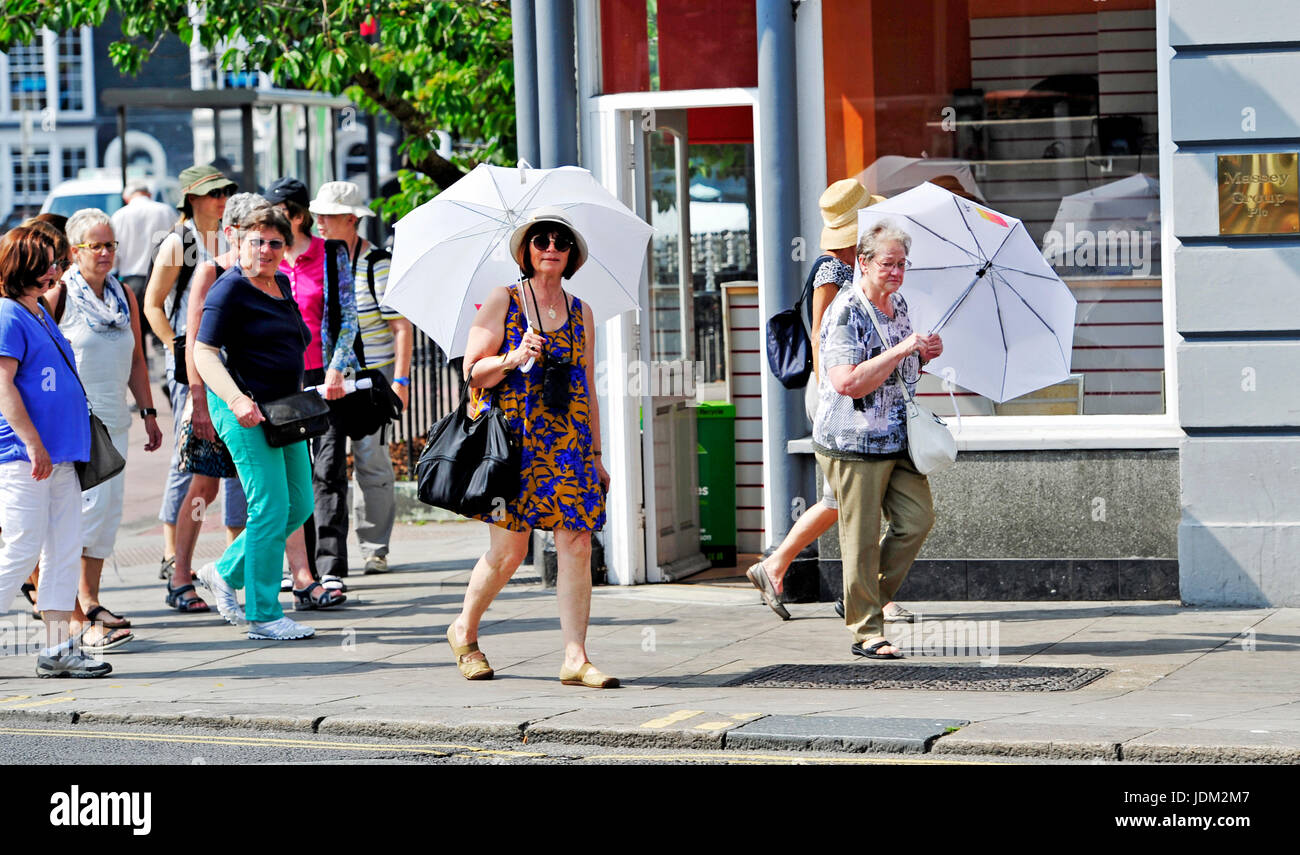 Brighton, UK. 21st June, 2017. These ladies get some shade under their ...