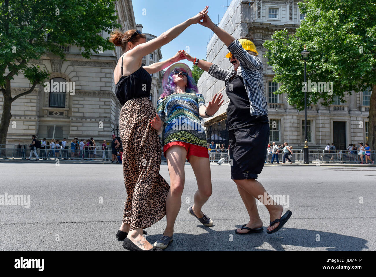 London, UK. 21st June, 2017. Anti-Tory protesters stage a "dance off ...