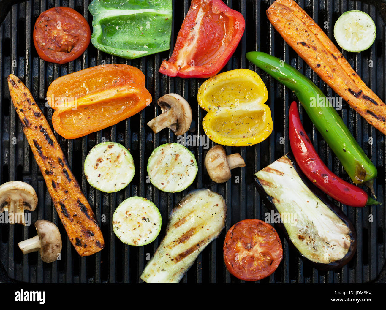 Grilled vegetables cooking. Top view Stock Photo - Alamy