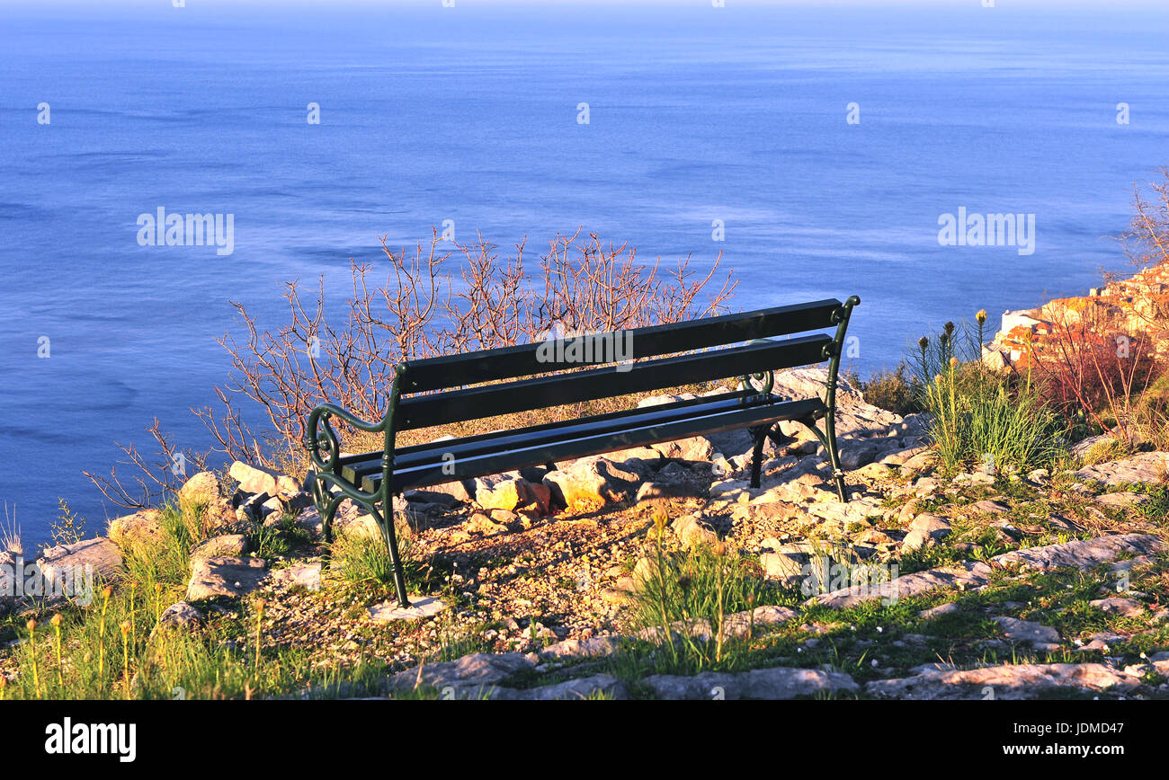 Wooden bench over the blue sea, summer landscape Stock Photo - Alamy