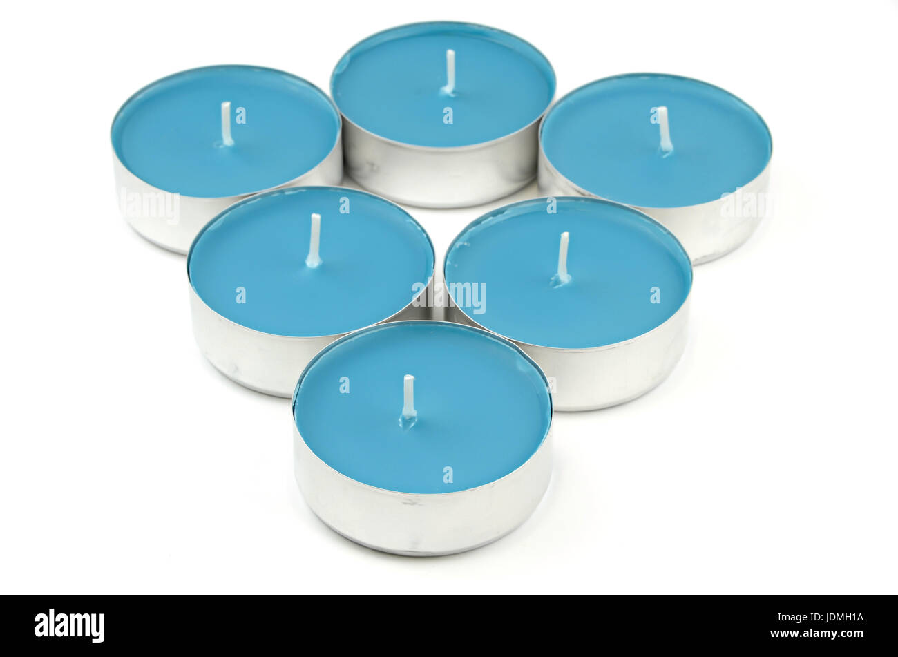 Blue Tea Lights for Relaxation on white background Stock Photo - Alamy