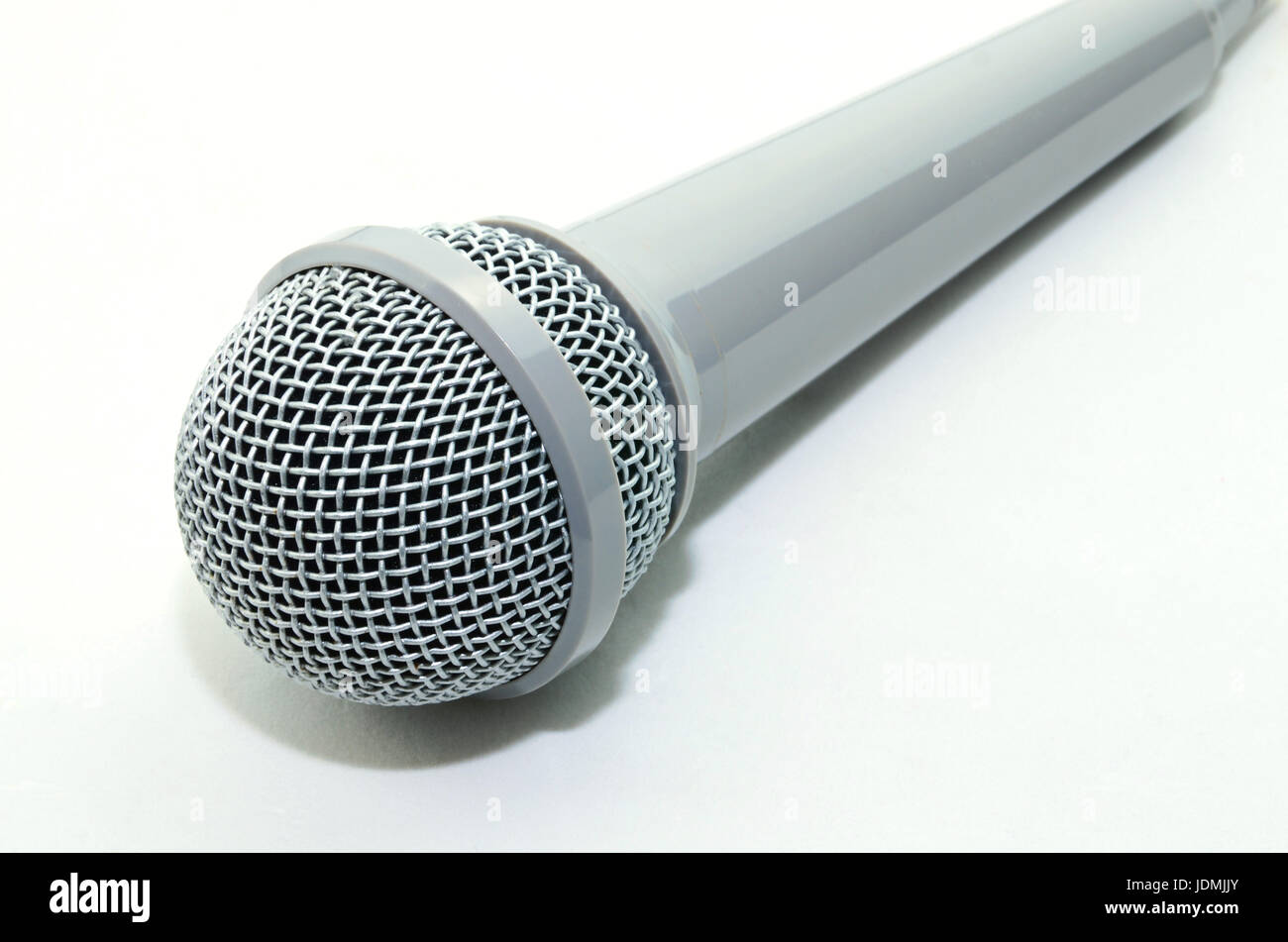 Microphone in gray colour on white background Stock Photo - Alamy