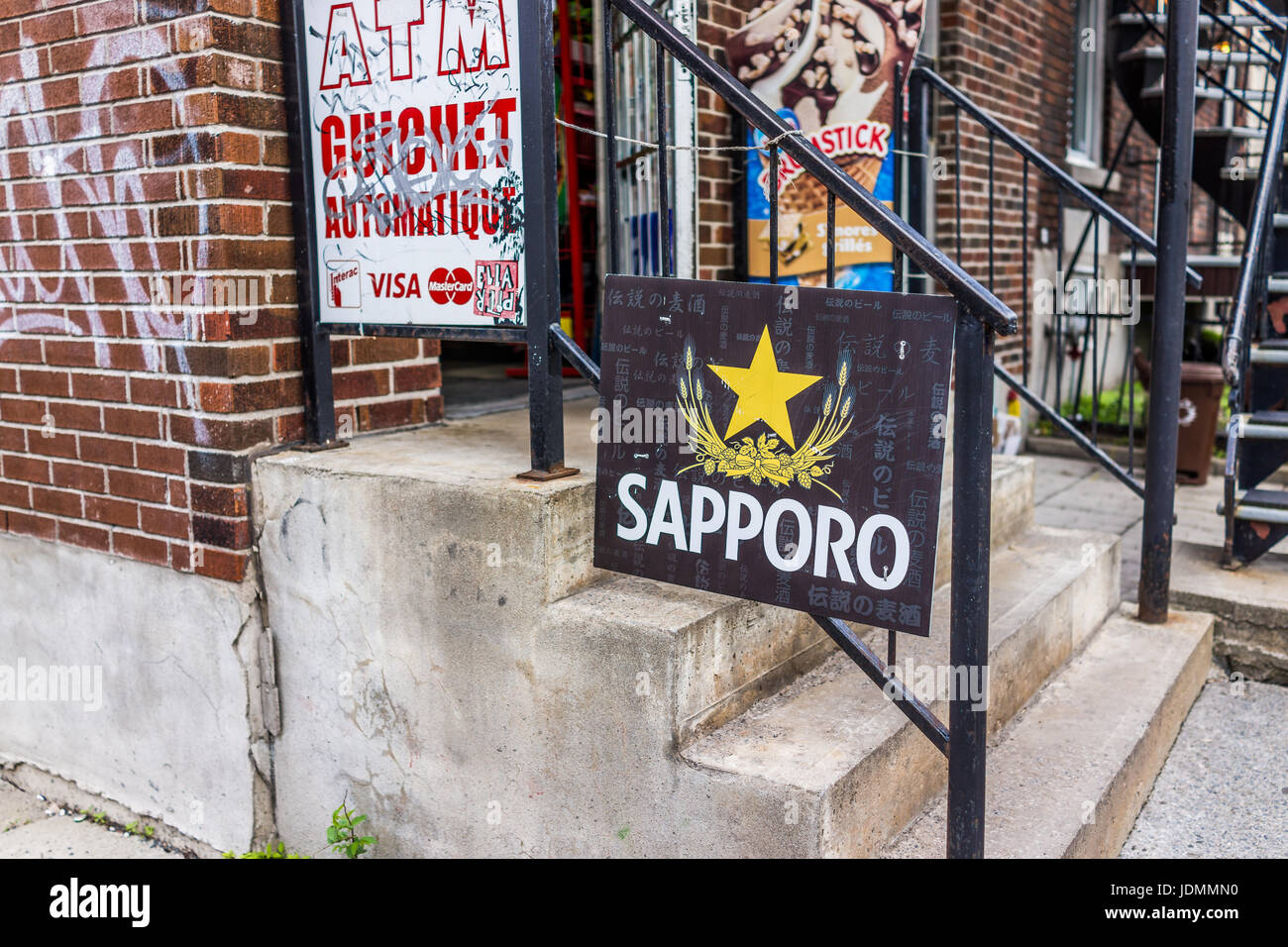 Montreal, Canada - May 27, 2017: Sapporo Japanese sign by liquor store ...