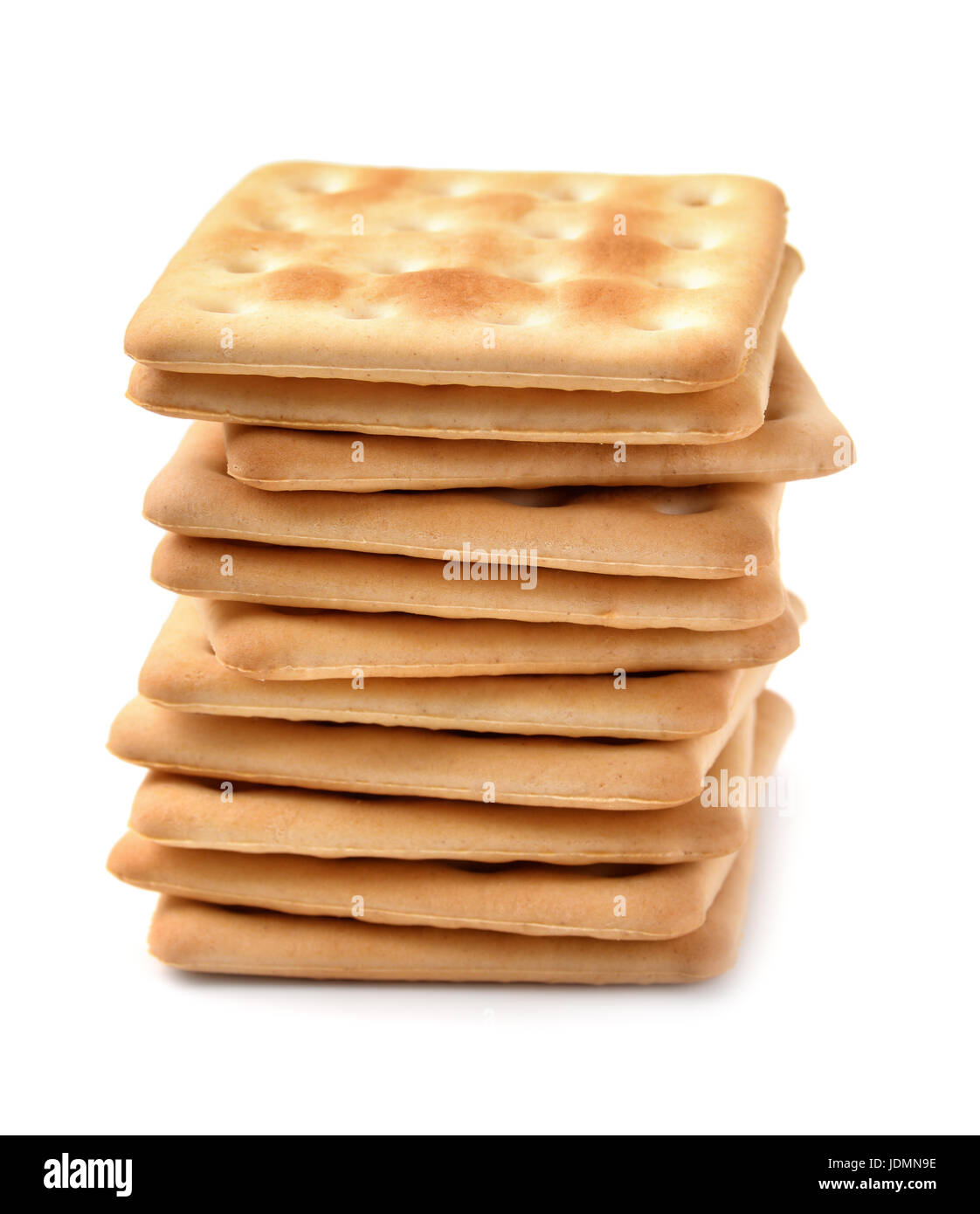 Stack of soda crackers isolated on white Stock Photo - Alamy