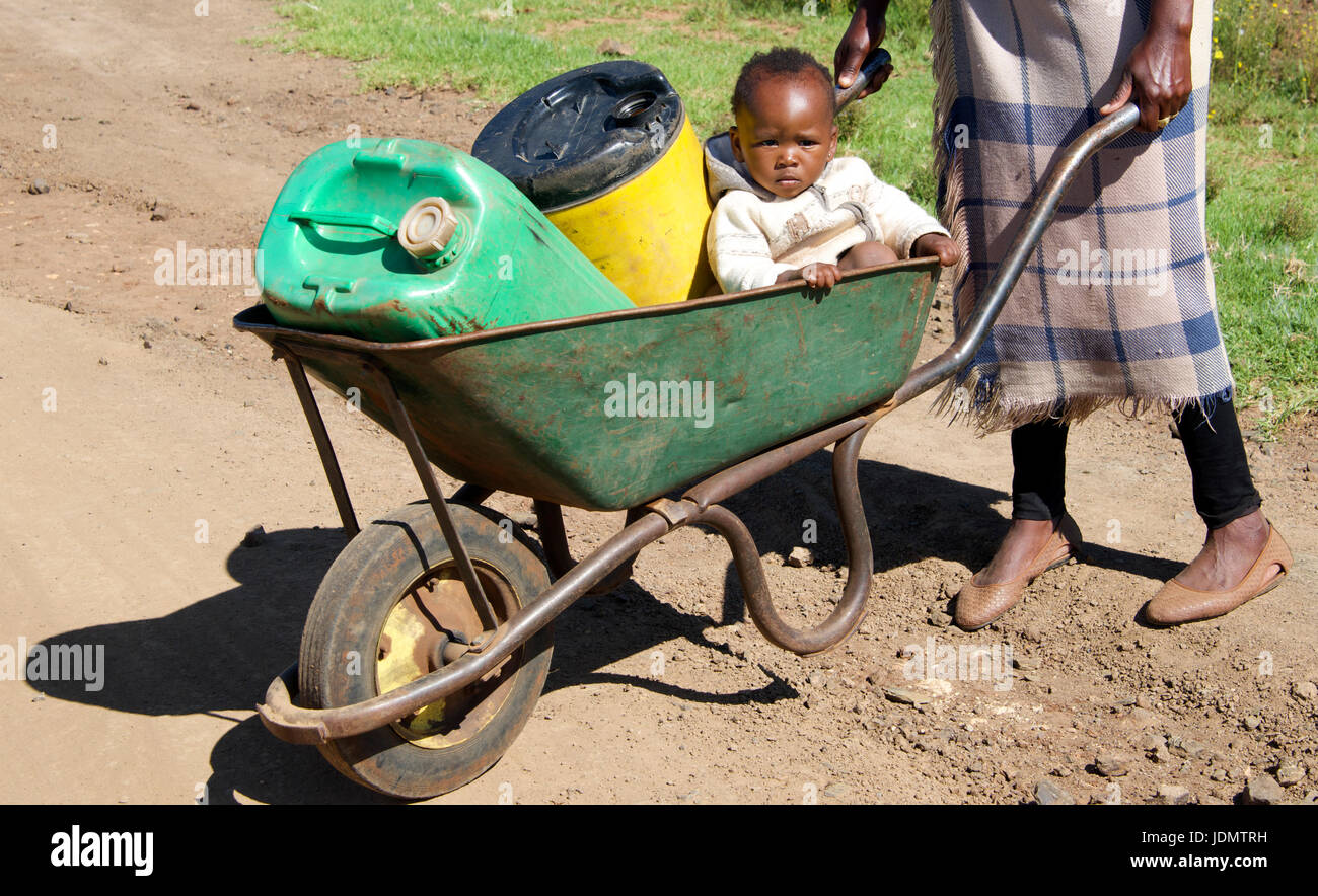 Baby transported in wheelbarrow Malealea Mafeteng District Lesotho ...