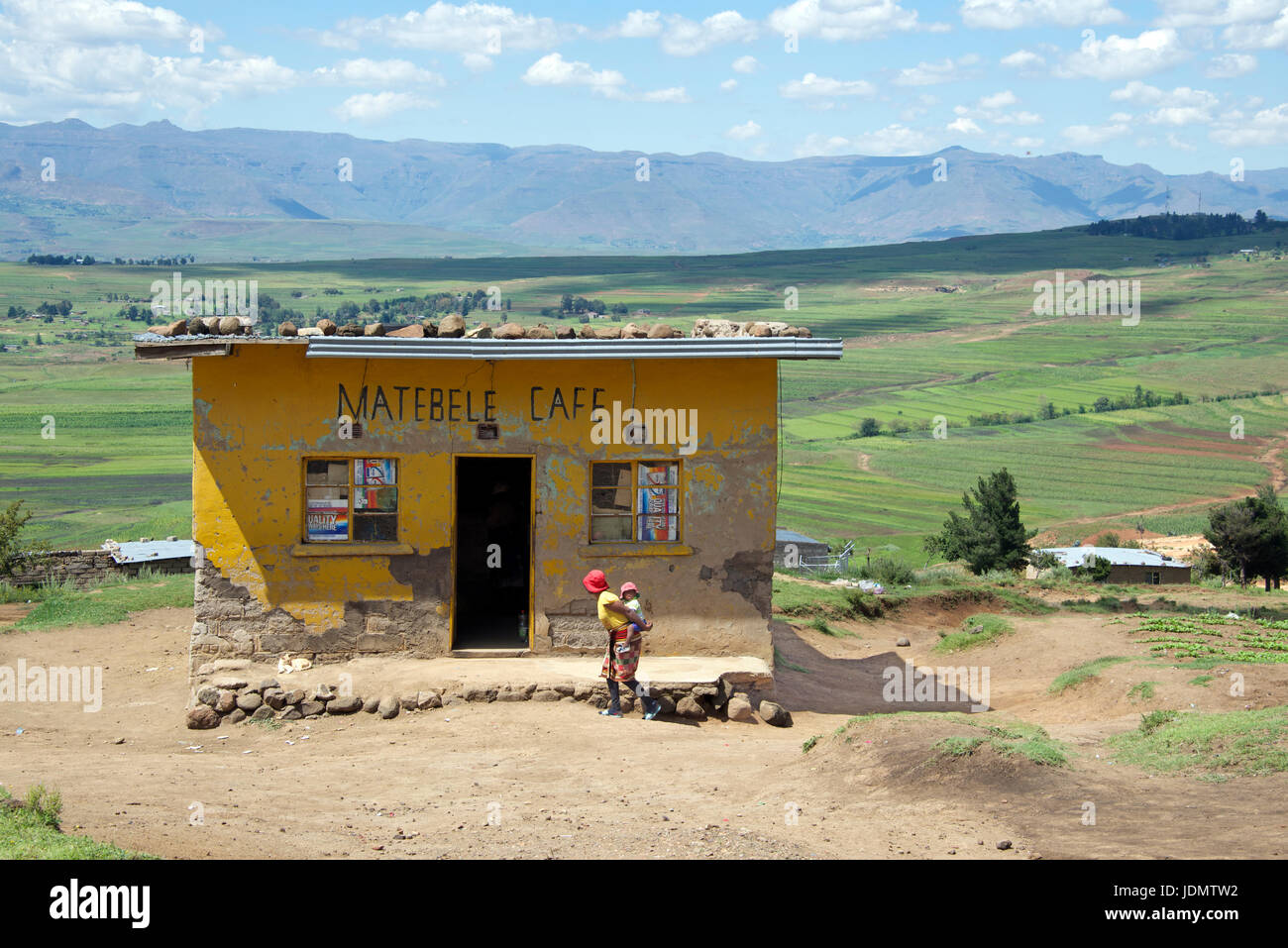 Mother and infant entering Matebele cafe Malealea Mafeteng District ...