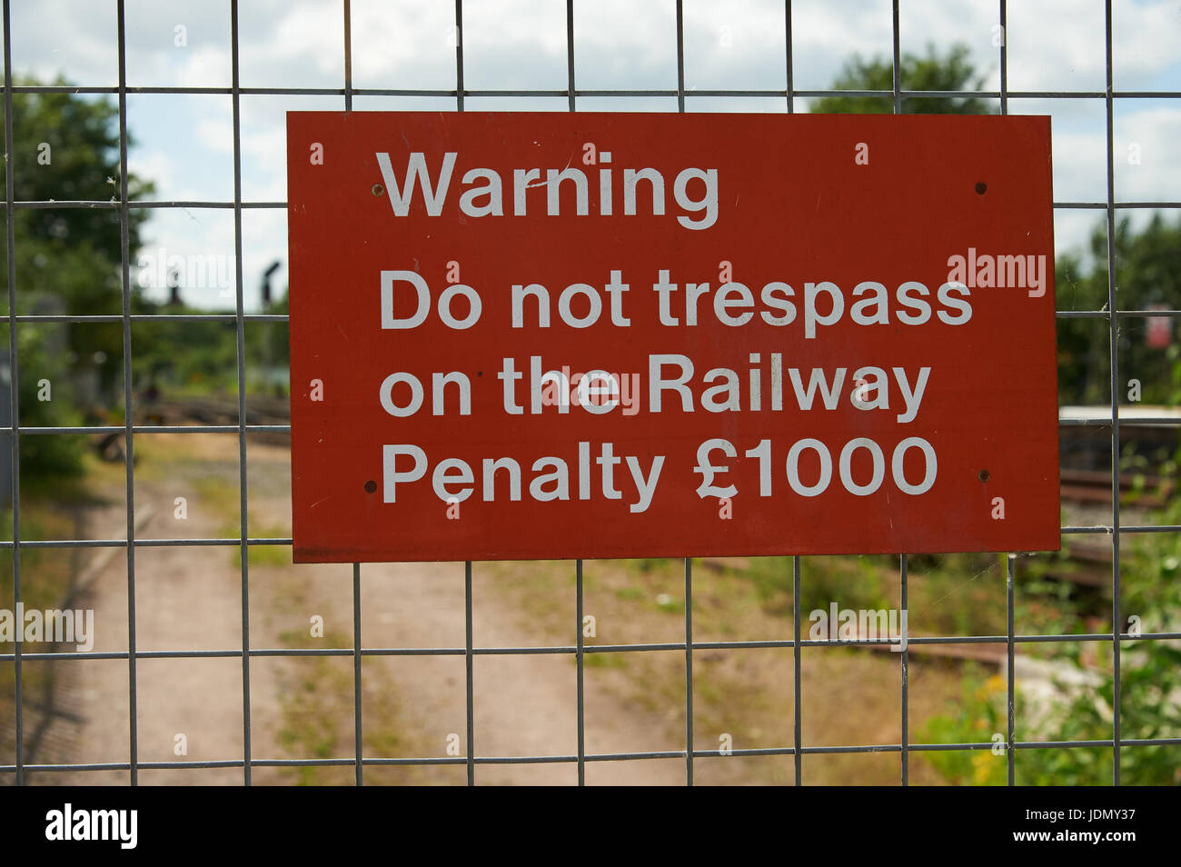 Red rectangular warning sign for railway network Stock Photo - Alamy