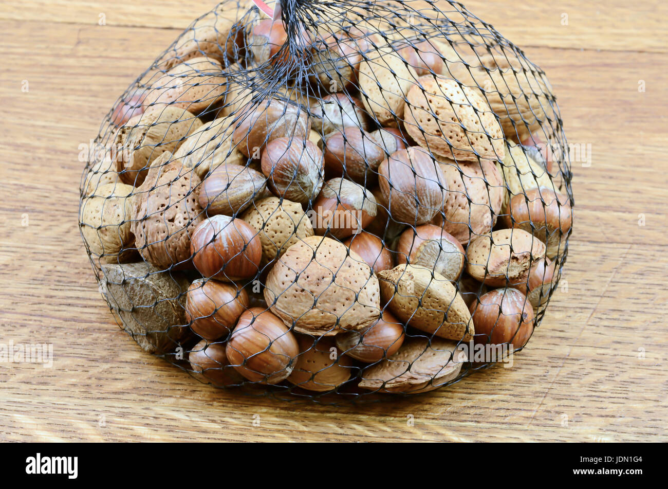 Bag of mixed nuts hi-res stock photography and images - Alamy