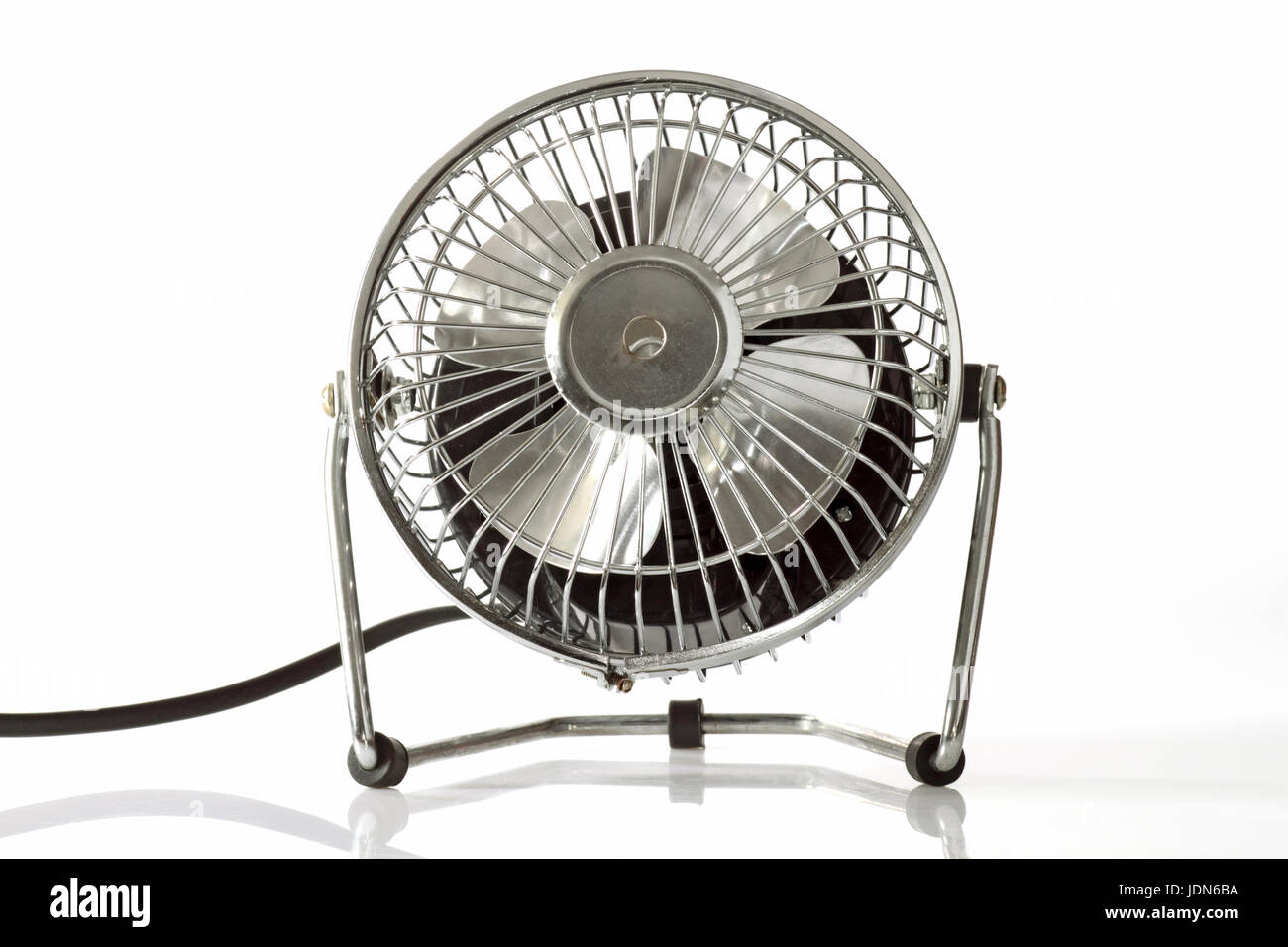 Electric silver fan on bright background Stock Photo - Alamy
