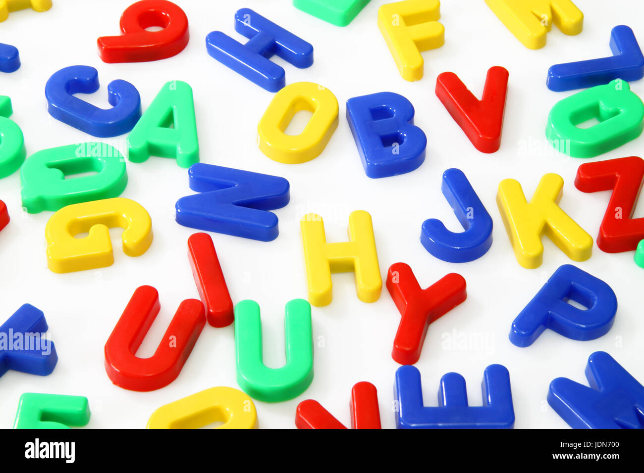 Plastic magnetic letters and numbers Stock Photo - Alamy
