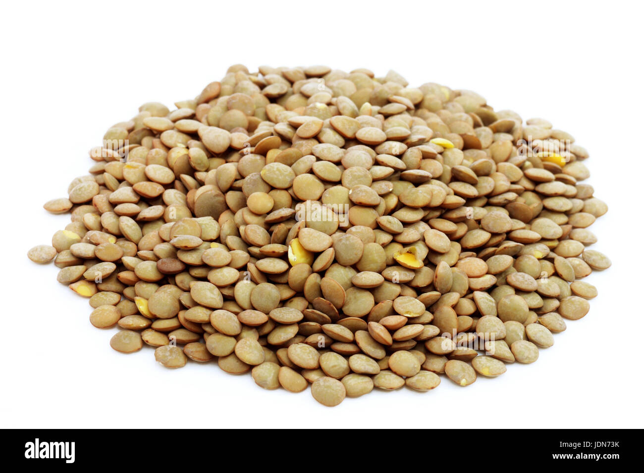 Pile of lentils on bright background Stock Photo - Alamy