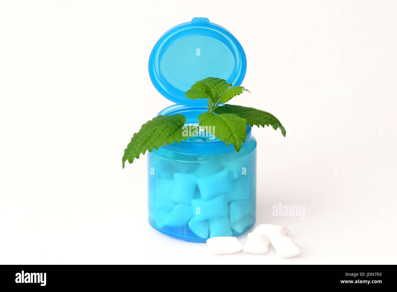 Peppermint chewing gum in beverage on white background Stock Photo - Alamy