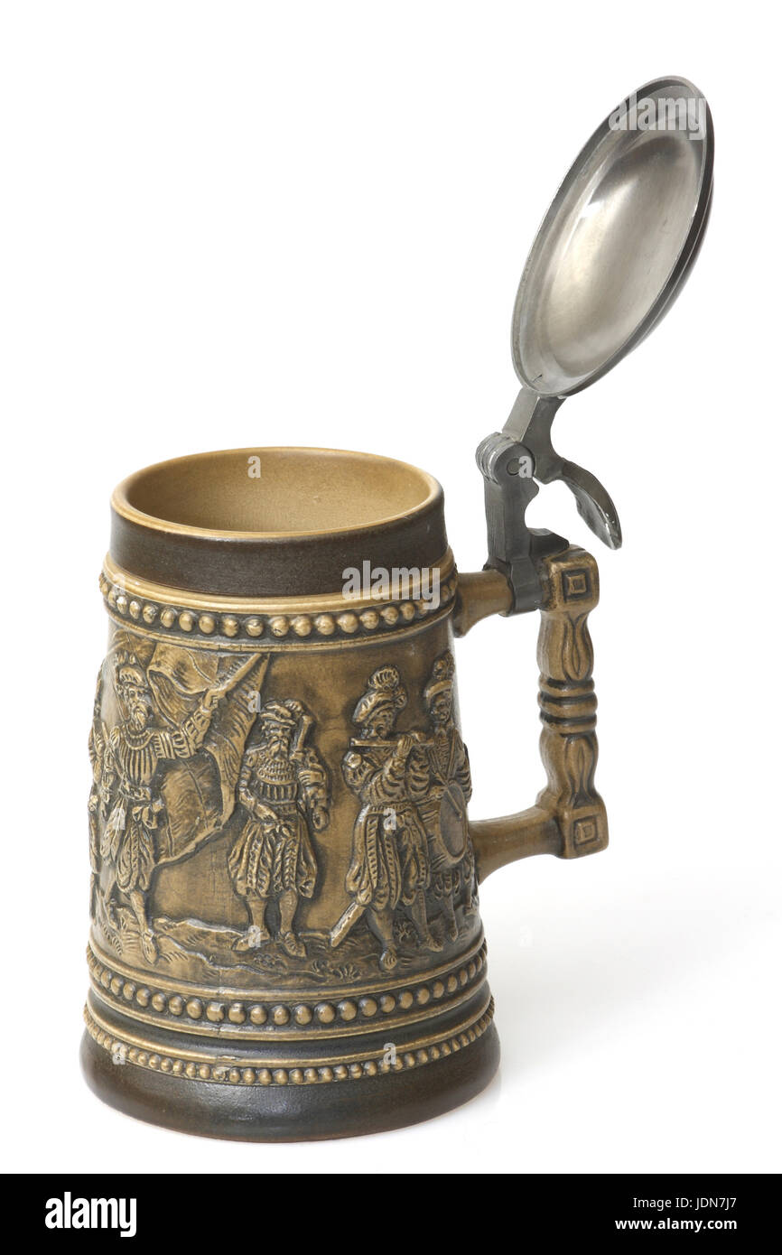 A traditional German beer jug with silver lid isolated on white ...
