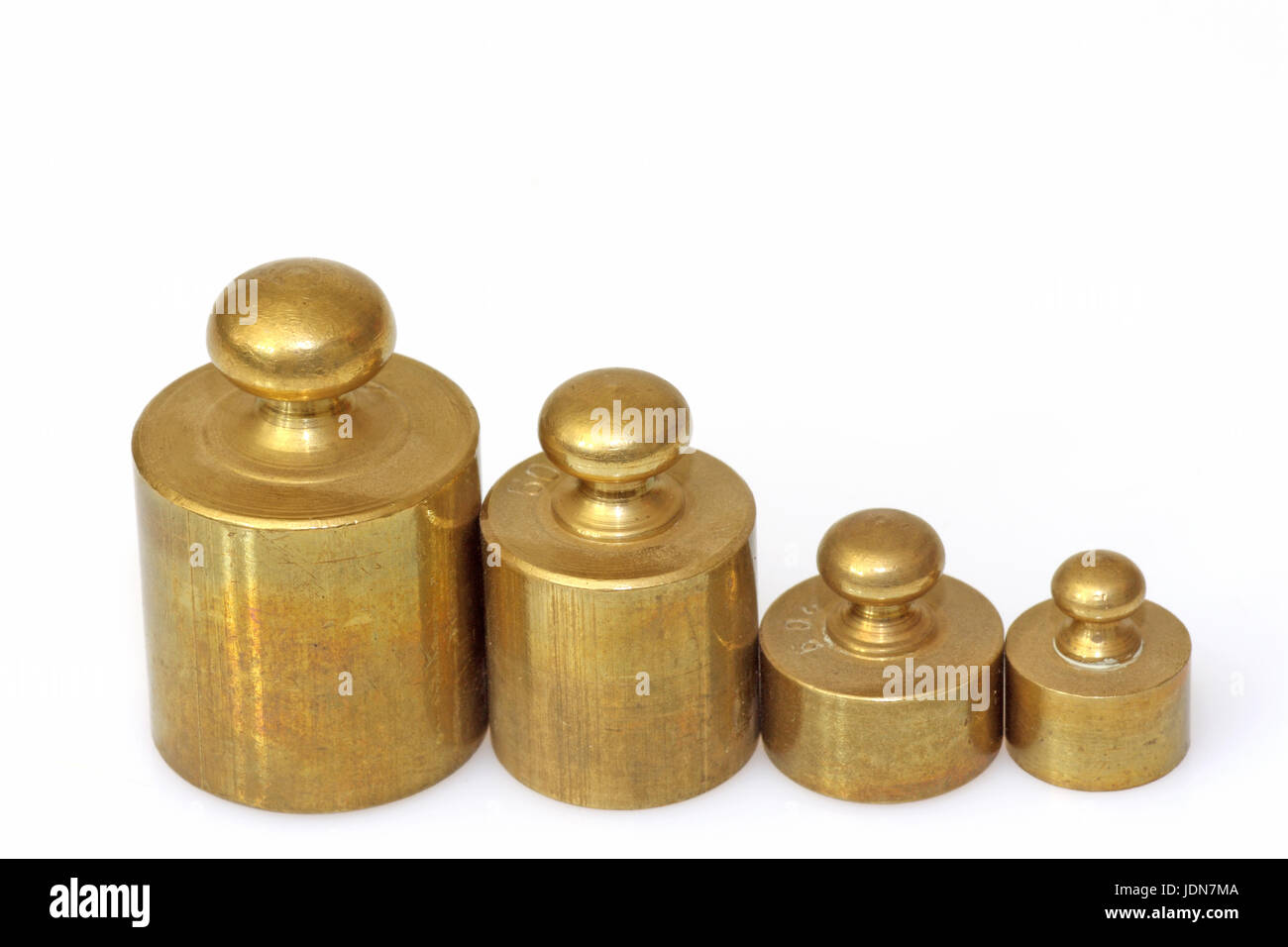 A set of lead weights isolated on whtie background Stock Photo - Alamy