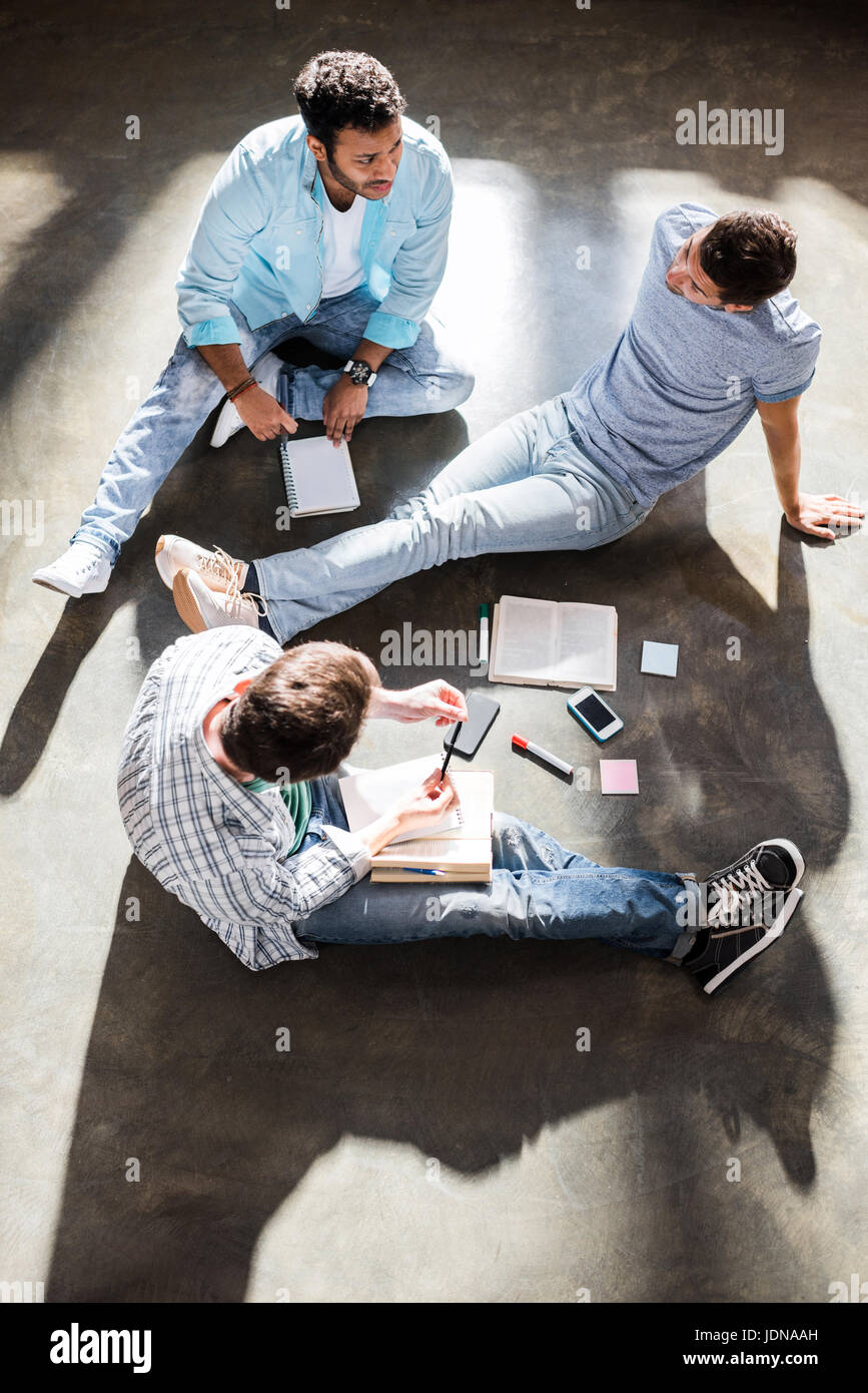 overhead view of small office meeting in small business office Stock ...