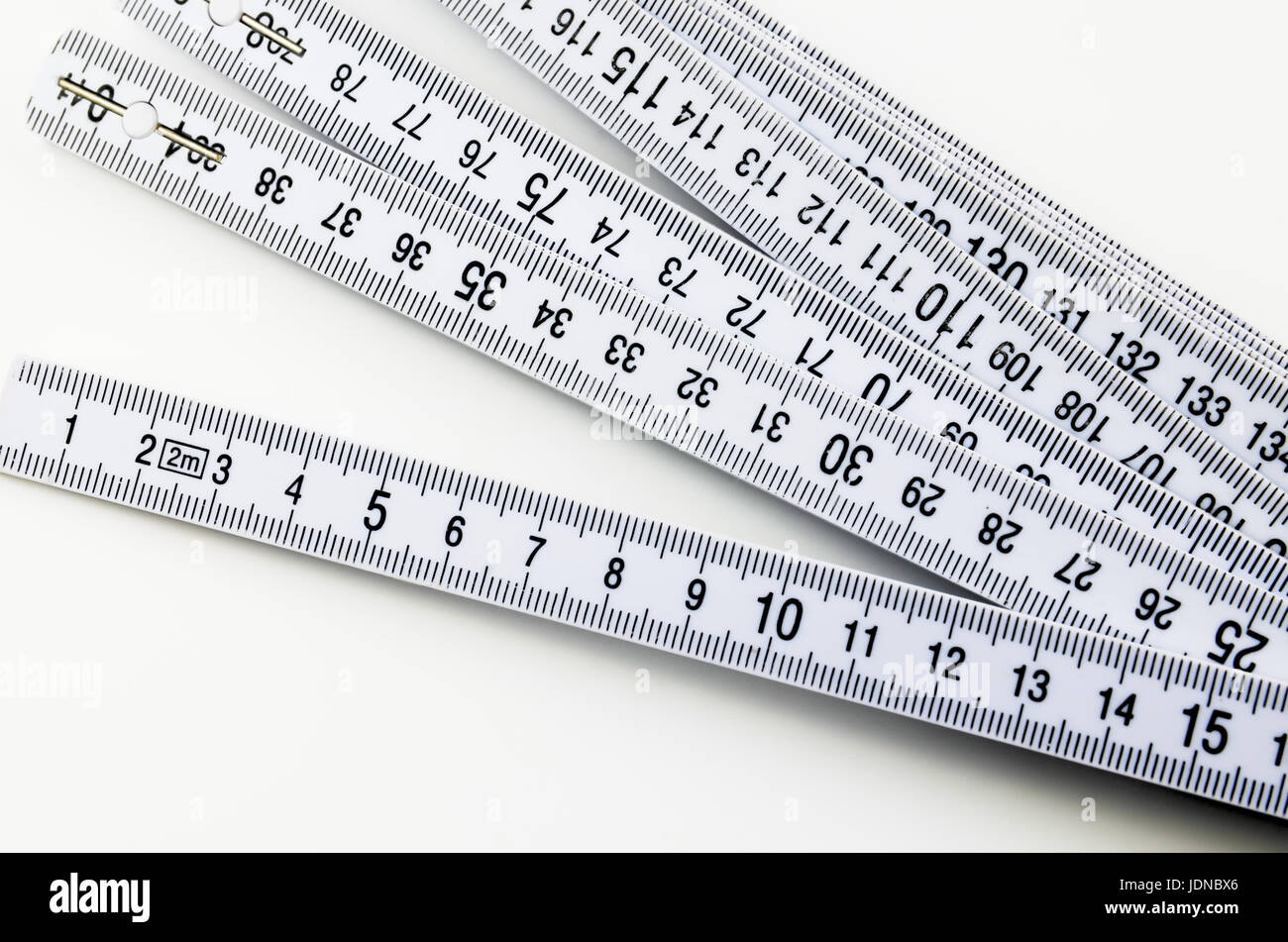 Plastic folding yardstick, ruler on white background Stock Photo - Alamy