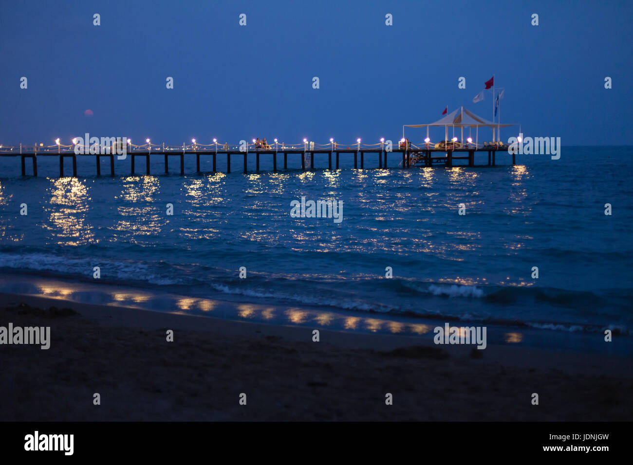 Beauty romantic pier with bright lightening during the beautiful summer ...