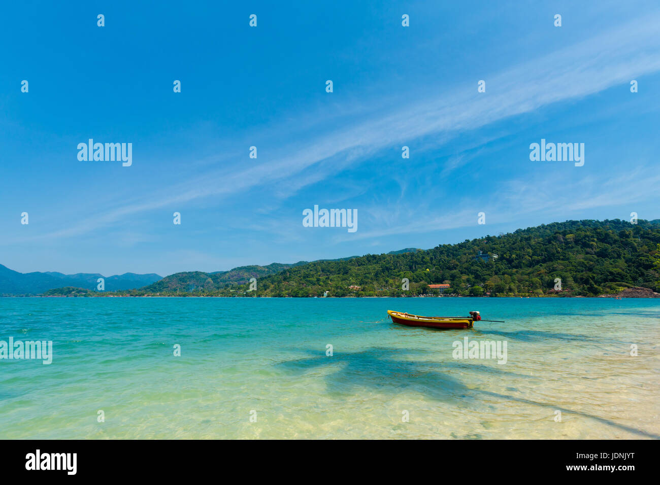 Summer landscape with beautiful small boat on remote tropical island Ko ...