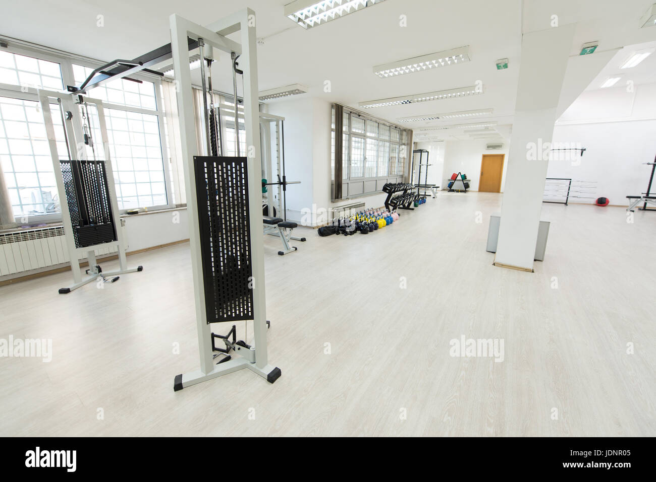 Modern Gym Room Fitness Center With Equipment And Machines Stock Photo ...