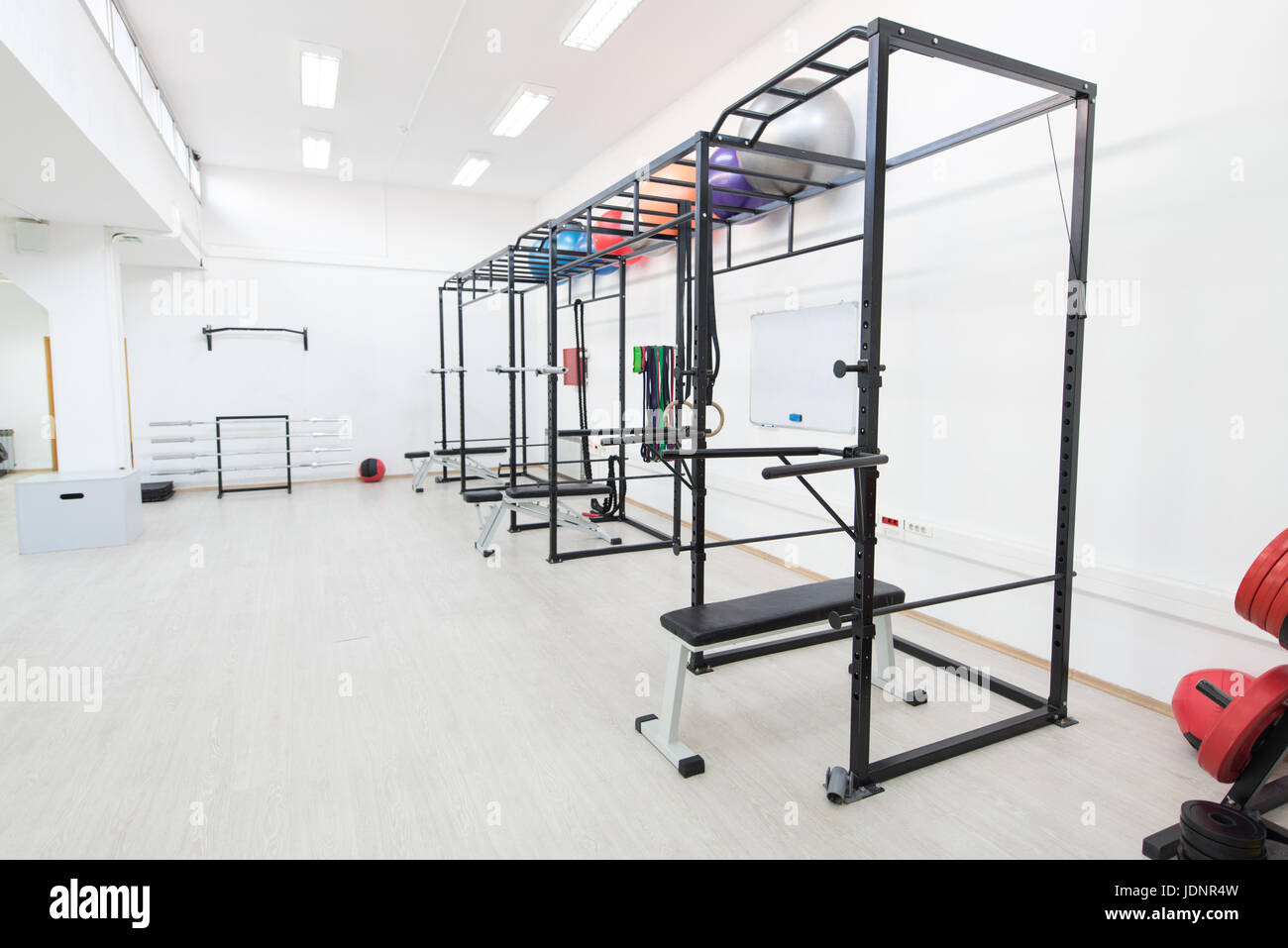 Modern Gym Room Fitness Center With Equipment And Machines Stock Photo ...