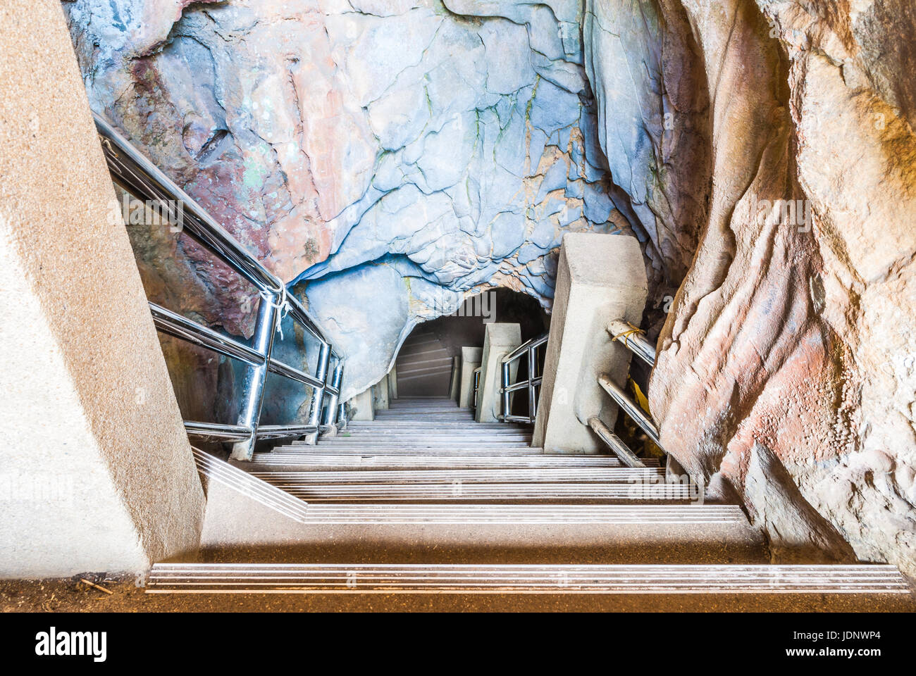Concrete Stairway into Beautiful Cave Stock Photo - Alamy