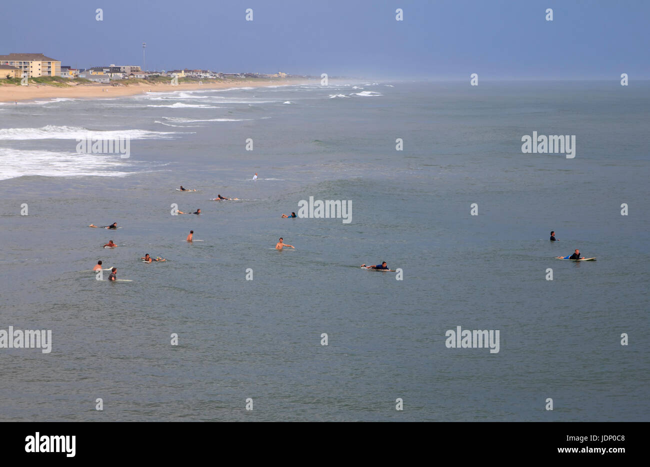 Surfers in Atlantic Ocean at Nags Head Beach Outer Banks North Carolina ...