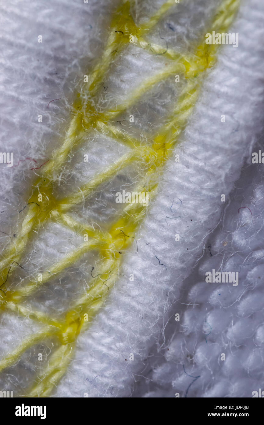 Yellow stitches hi-res stock photography and images - Alamy