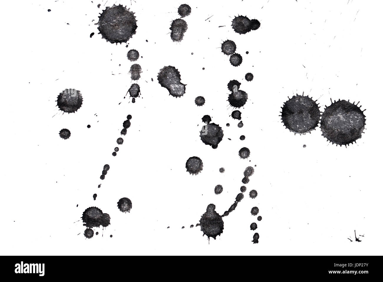 Black ink spatter on white paper hi-res stock photography and images ...