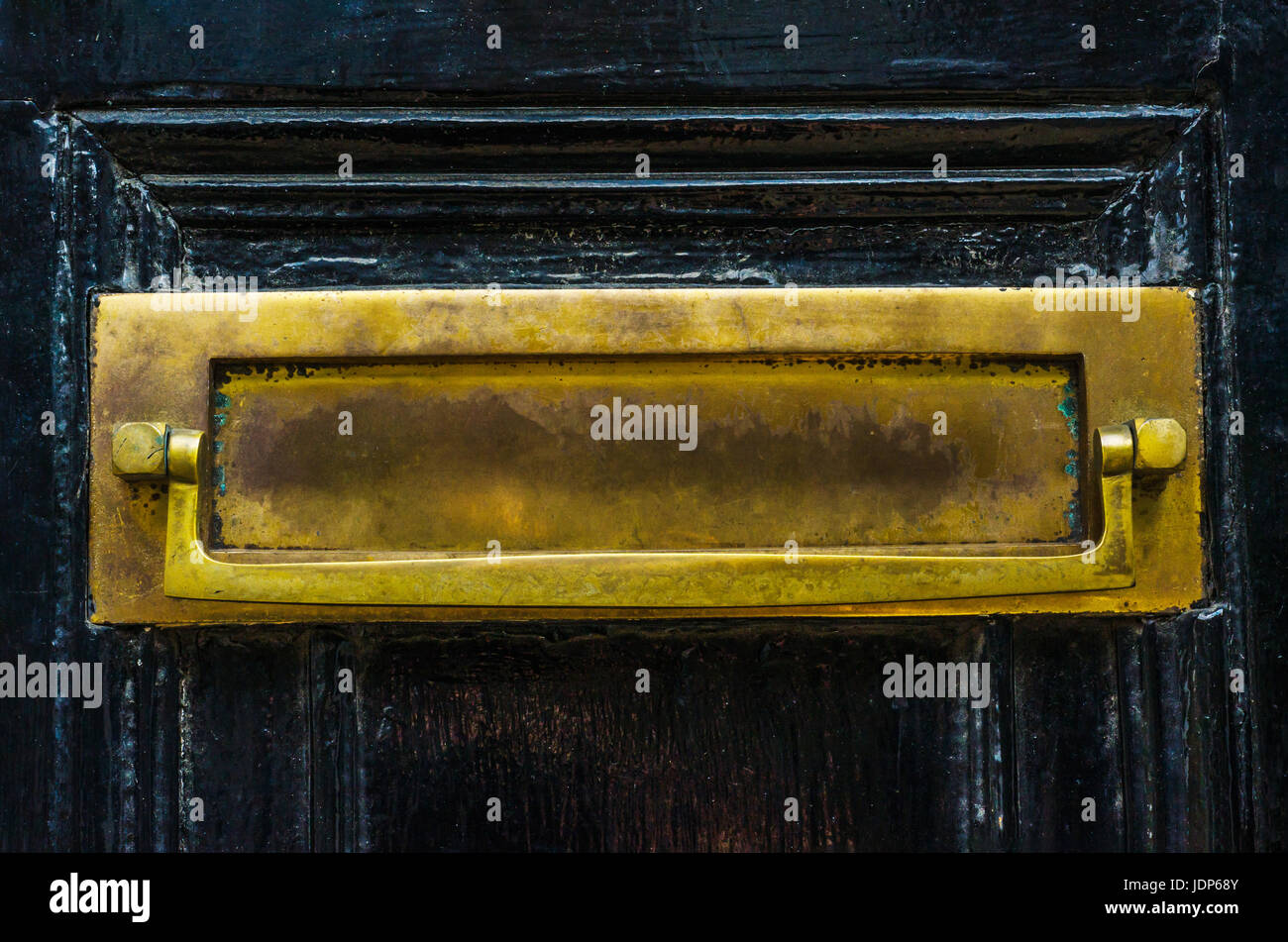 Old letterbox in the door, traditional way of delivering letters to the ...