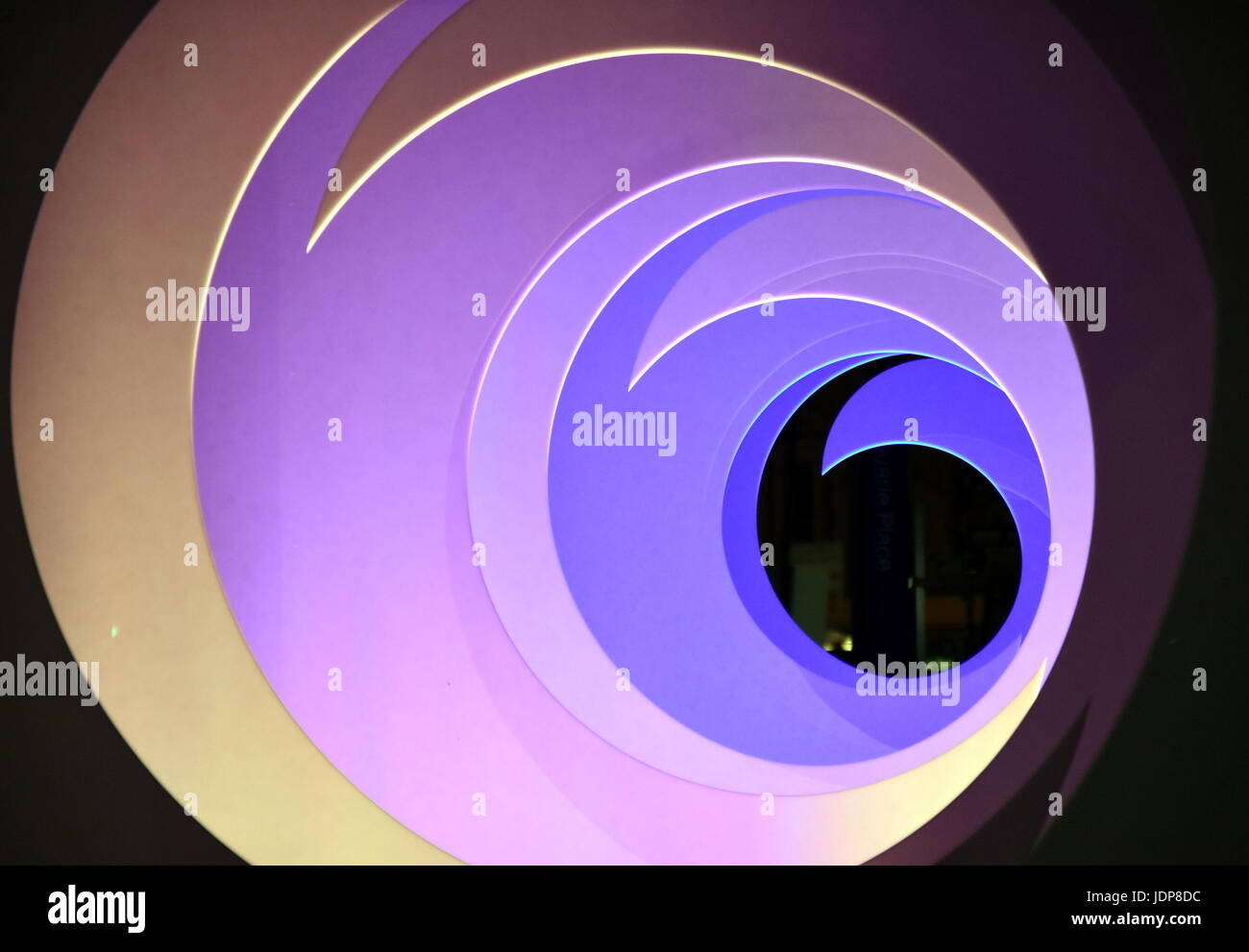 Helix light installation. Comprised of large, glowing, that soar from a ...