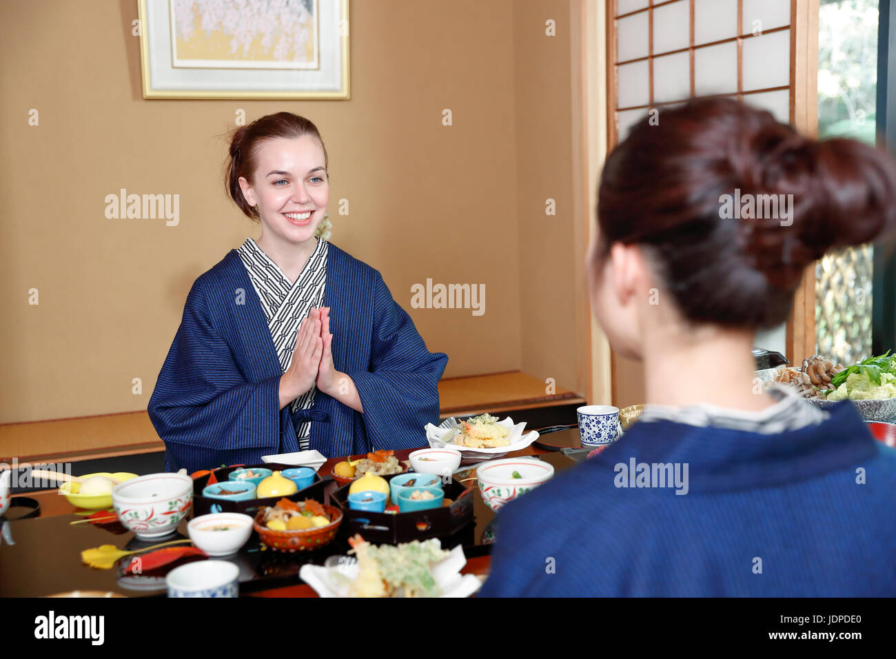 Eating traditional japanese food kimono hi-res stock photography and ...
