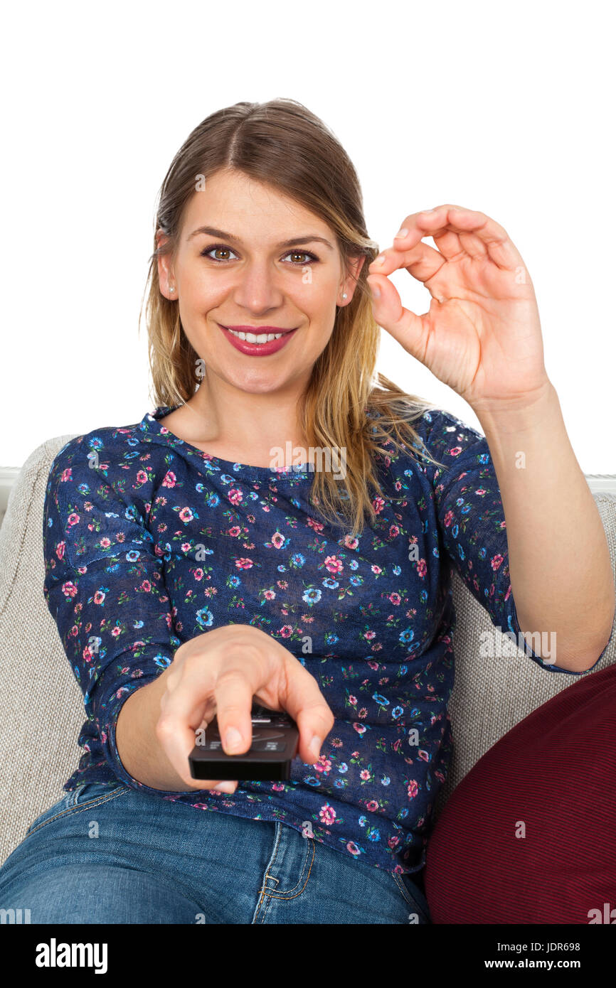 Picture of a beautiful young woman watching her favourite tv show at ...