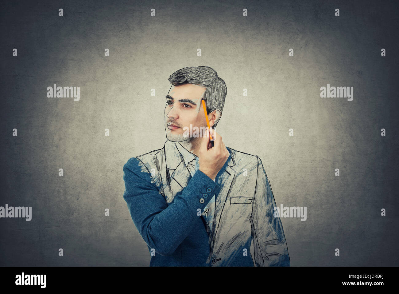 Young businessman man thinking with a pencil pointed to his head, try ...