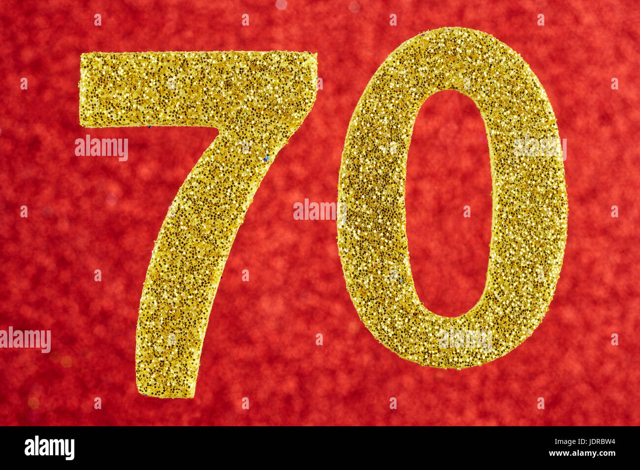 Number seventy yellow color over a red background. Anniversary ...