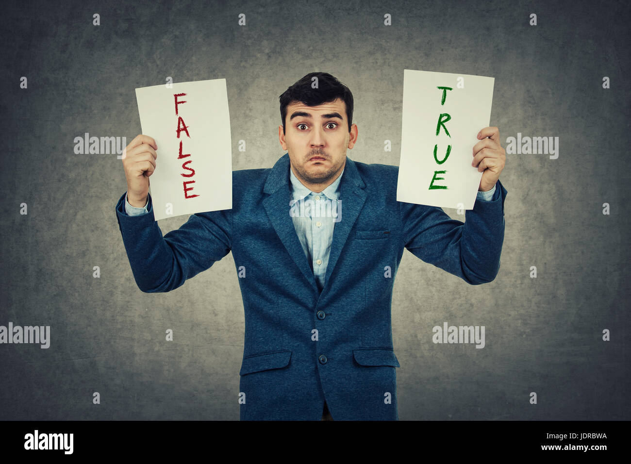 Confused man papers hi-res stock photography and images - Alamy