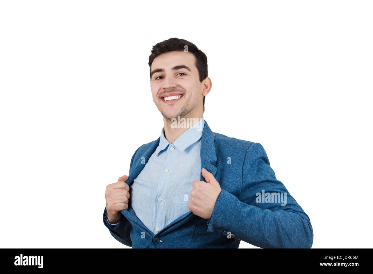 Young smiling businessman acting with courage like a super hero and ...