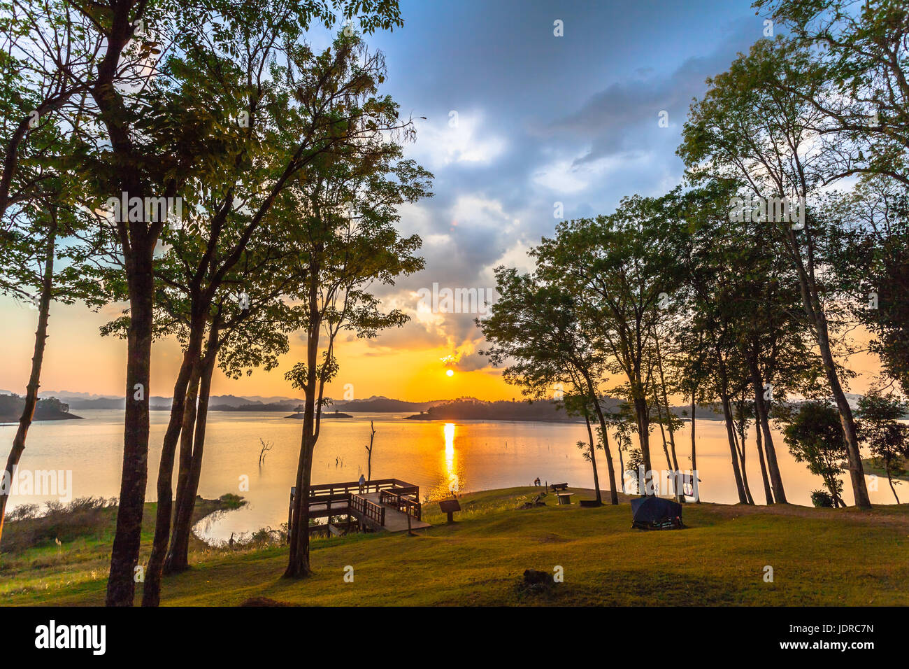 Stunning panoramic view of the lake in sunset time. light through the ...