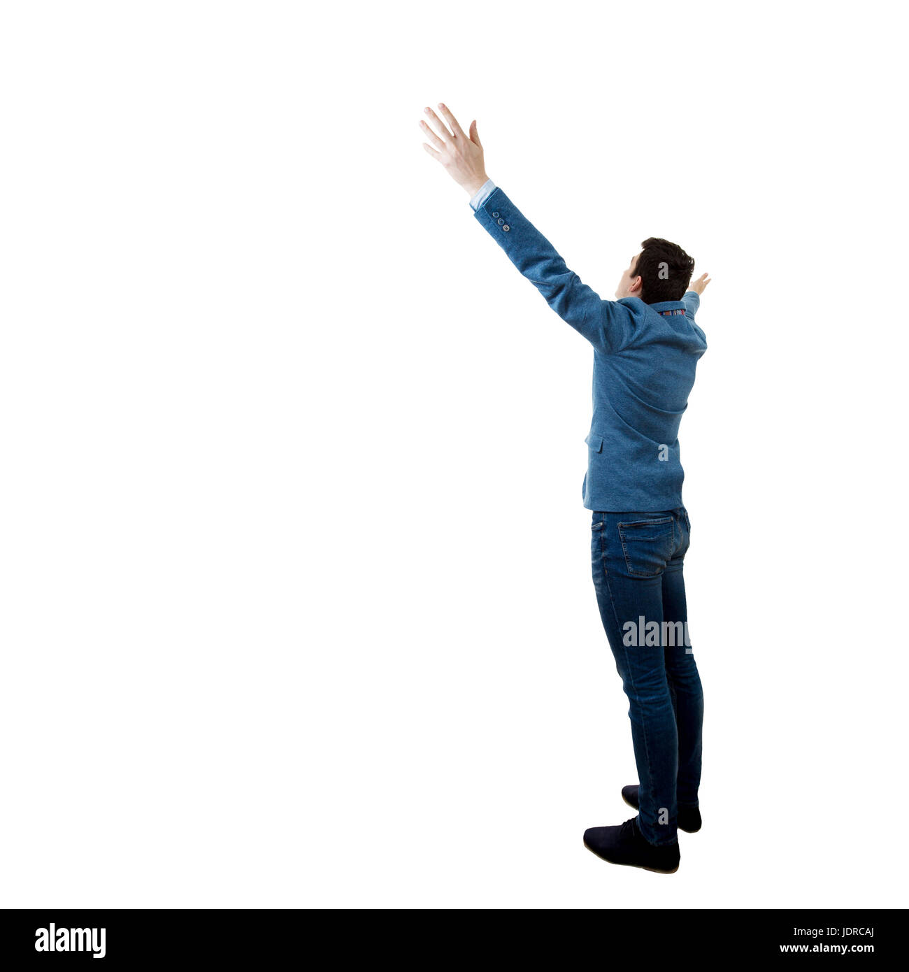 Rear View of a Young businessman excited looking up winning celebrating ...