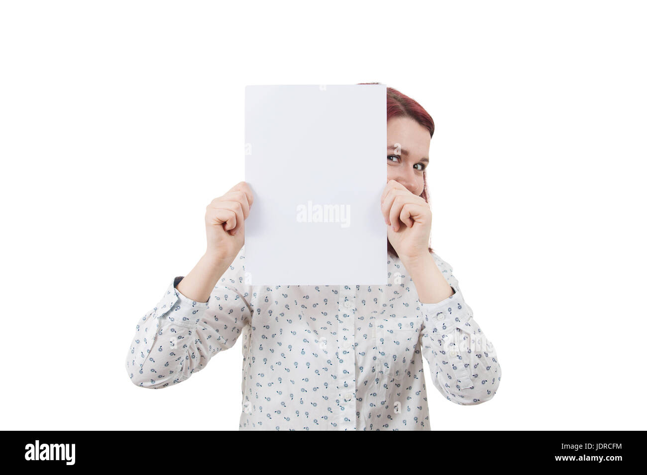 Women hiding face after a white paper with a happy emotion isolated on ...