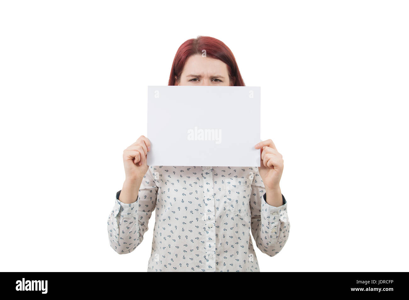 Young Women hiding face after a white paper with a stressed emotion ...
