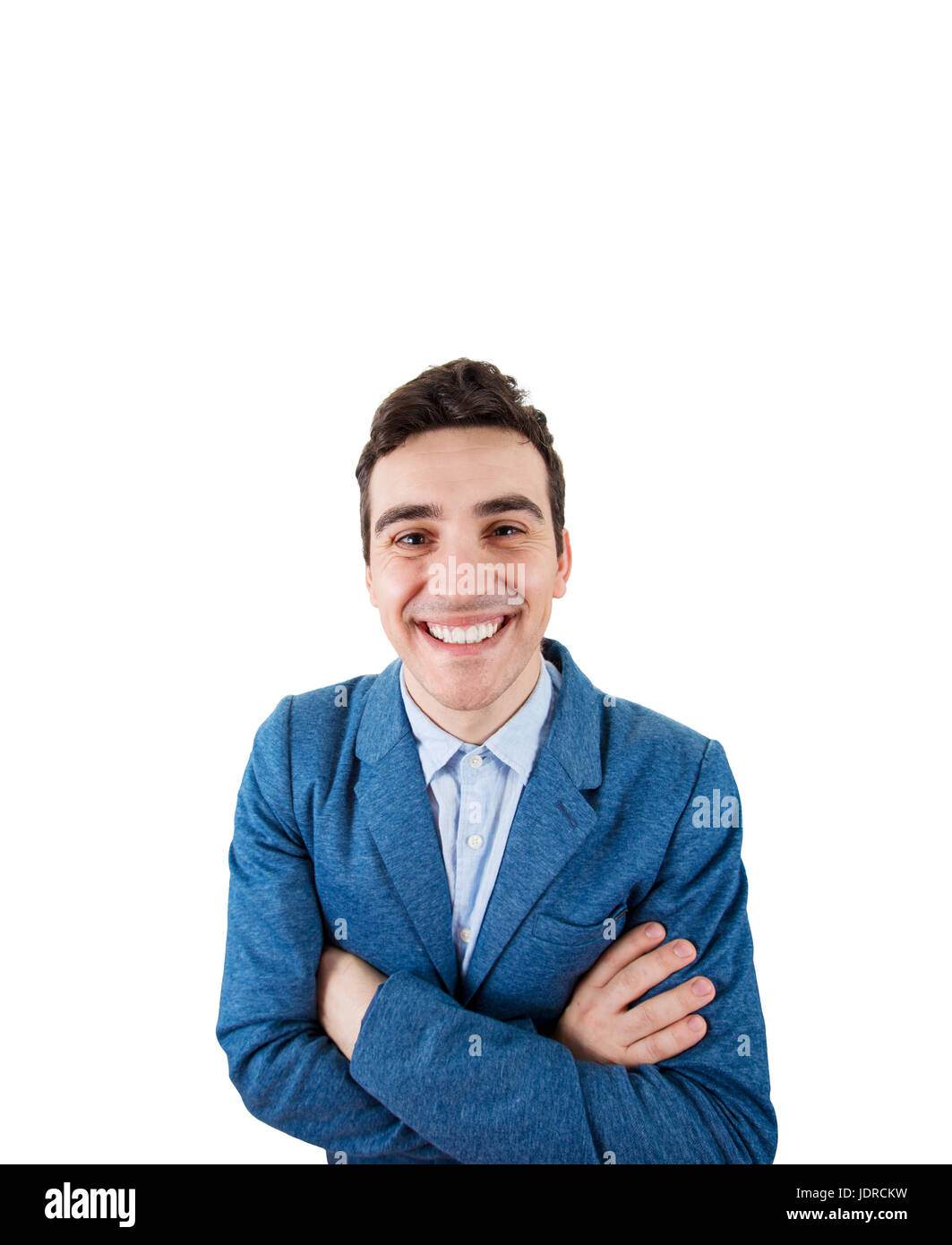 Smiling Young confident businessman with crossed hands over white ...