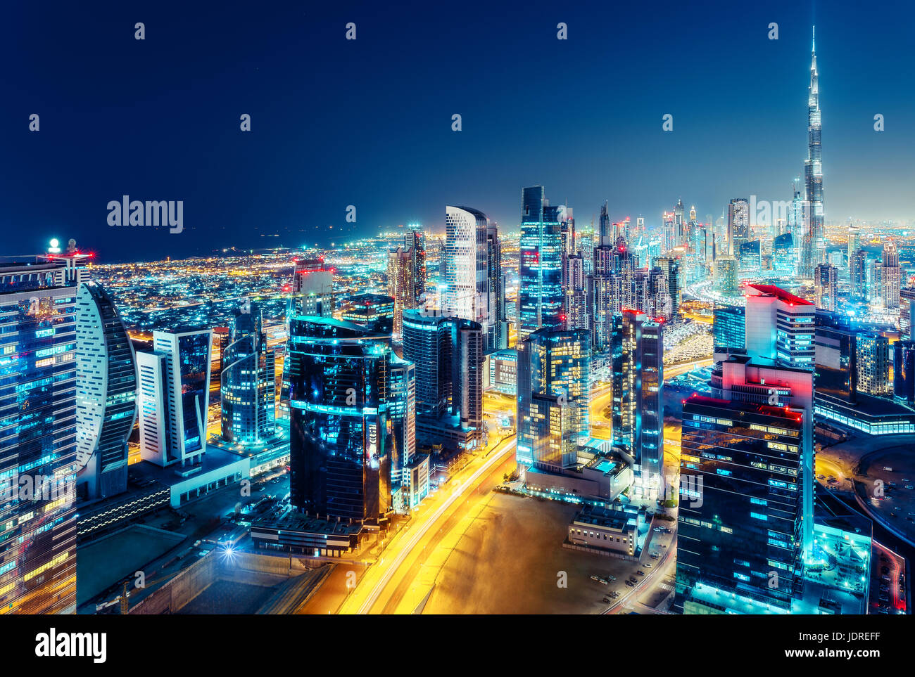 Nighttime skyline of Dubai, United Arab Emirates. Rooftop view.of ...